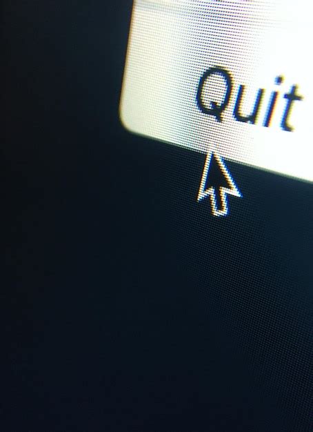 Premium Photo Close Up Of Quit Text And Cursor On Device Screen