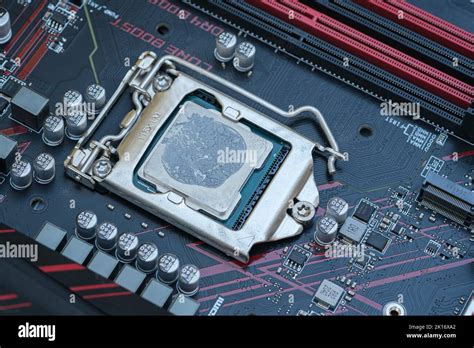 Pc Cpu With Dried Thermal Paste On Hi Tech Motherboard Computer Components Chip Stock Photo Alamy