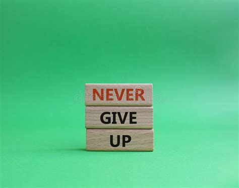 Never Give Up Symbol Concept Words Never Give Up On Wooden Blocks
