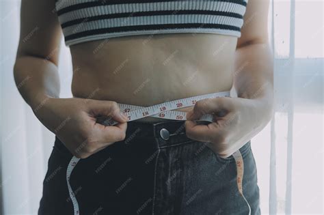 Premium Photo Women Body Fat Belly Obese Woman Hand Holding Excessive