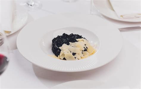 Premium Photo Delicious Italian Risotto With Cuttlefish Ink Squidink