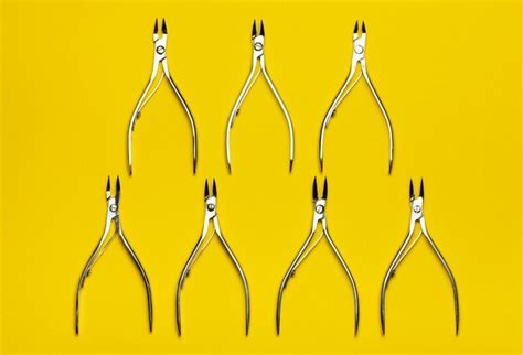 Premium Photo | Professional manicure tools on a white background ...
