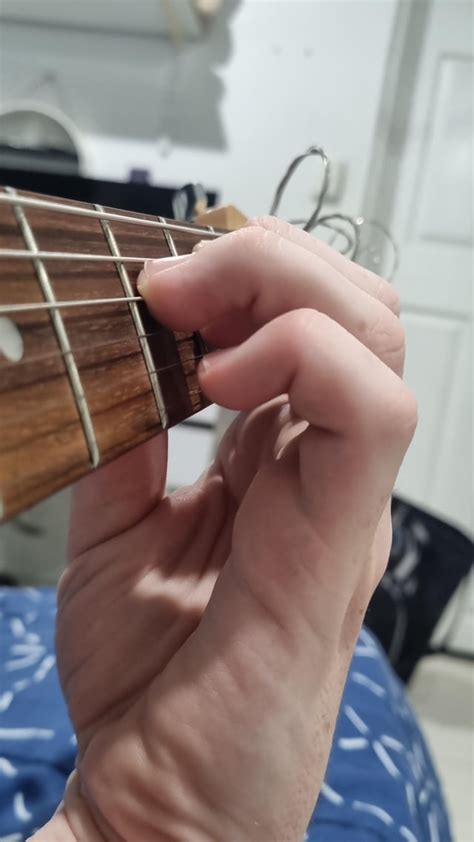 how do i stop touching other strings when playing chords or how do i