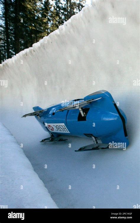 Andrea Popescu And Aura Popescu Of Team Romania Slide Through The
