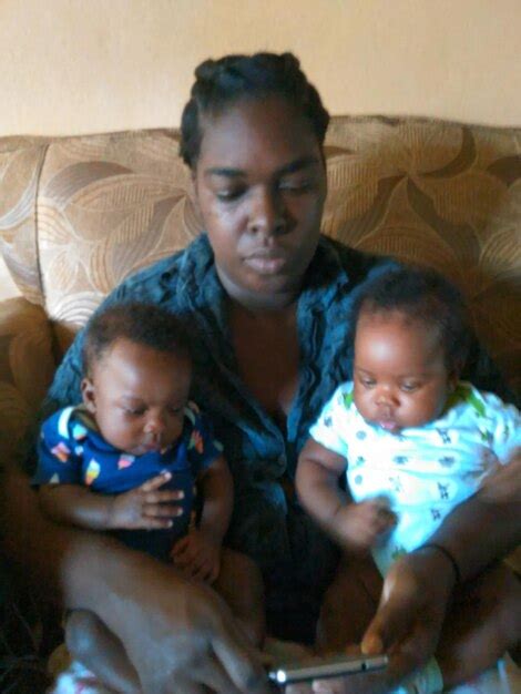 Premium Photo Mommy Entertaining Twin Girls