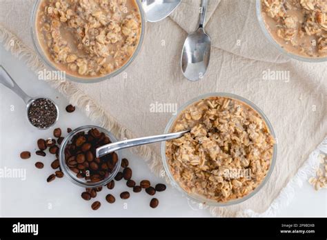 Three Dishes Of Vanilla Cold Brew Overnight Oats Small Glass Bowls Of