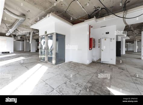 An Empty Office With All The Materials Disassembled And Cables Hanging To Make A New Reform