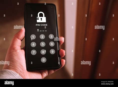 woman accessing smartphone with pin code cyber security concept