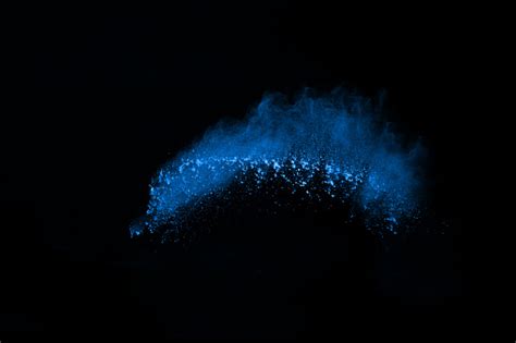 Abstract Blue Powder Splatted Background Freeze Motion Of Color Powder