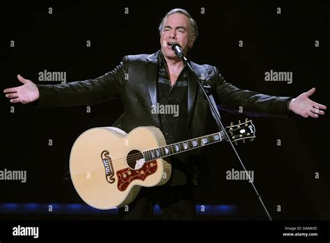 Us Singer Neil Diamond Performs On Stage During A Concert At The O2