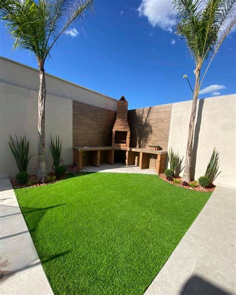 Modern Garden Design With Grass Benches And Palm Trees Patios