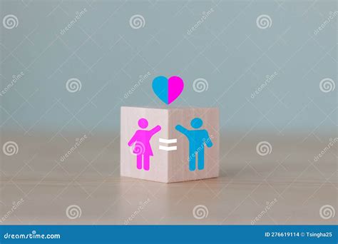 Concept Image Of Gender Equality Male And Female Symbols Are Sex Icons On A Wooden Cube