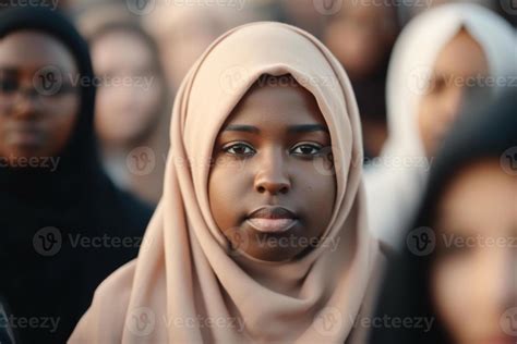 Arabic Woman Activist Leading Diverse Crowd Marching Protest Freedom
