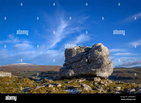 A Large Erratic Boulder On Keld Head Scar With Whernside In The Background Yorkshire Stock