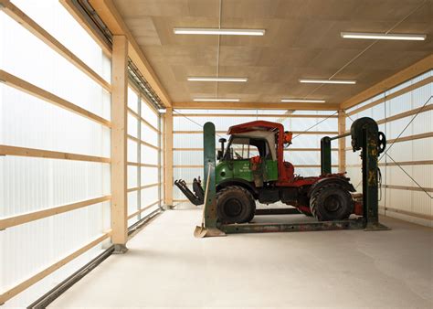 House Unimog Stores A Truck Within Its Translucent Base