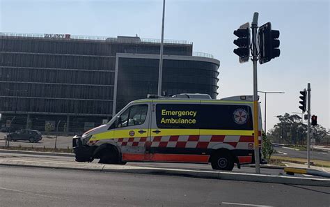 Ambulance And Car Collide At Intersection Outside Of Hospital Central