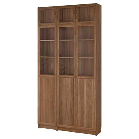 billy oxberg bookcase w hght ext ut pnl glss drs brown walnut effect