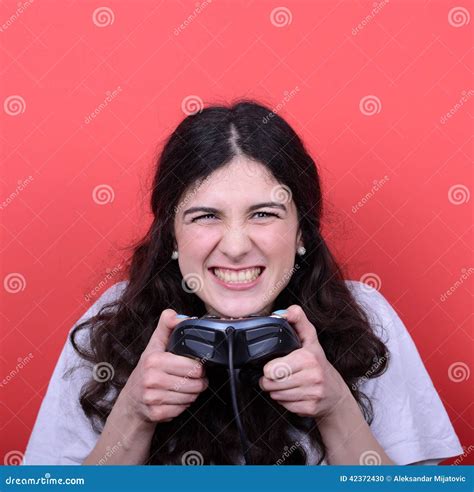 Portrait Of Girl Holding Game Controller And Playing Games Again Stock