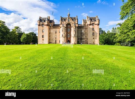 Beautiful Scenery Of The Fyvie Castle Surrounded By Greenery In
