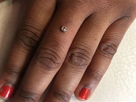 Finger Dermal Piercing