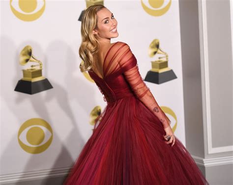 Miley Cyrus Wearing Red Gown At Grammys 2018 Popsugar Fashion Uk