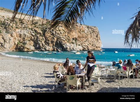 People At An Outdoors Beach Bar In Calahonda Granada Province Spain