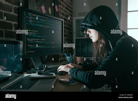 Young Professional Female Hacker Using Keyboard Typing Bad Data Into