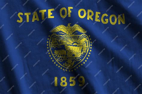 Premium Photo Oregon Us State Flag With Big Folds Waving Close Up