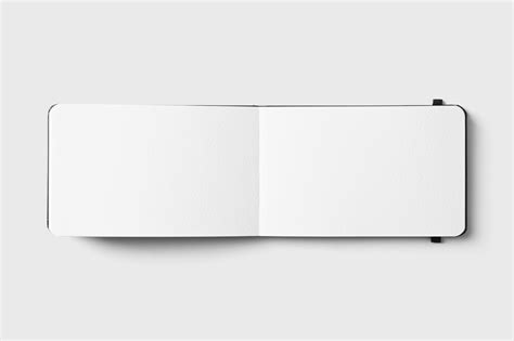 Free Open Notebook With Rubber Mockup Mockupbee