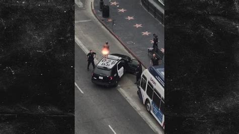 Naked Man Dances On Lapd Patrol Car Near Hollywood Walk Of Fame