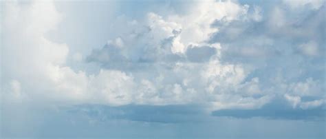 Premium Photo Dense Mass Of Clouds In A Clear Sky