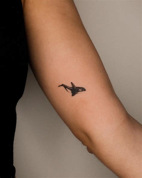 Fine Line Orca Tattoo Artistry Elegant Blackwork Designs