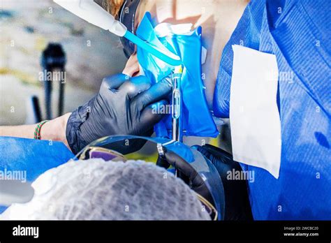 Give An Injection Of Anesthesia To A Sick Woman Before His Treatment