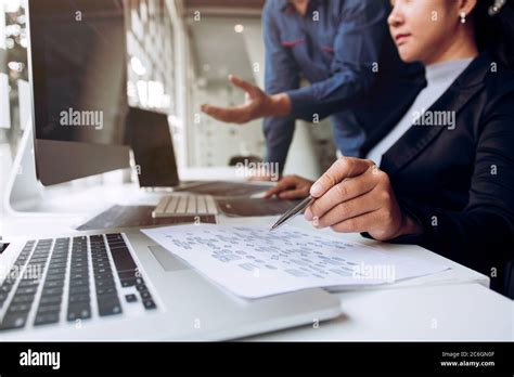 two asian team working development of programming and encryption