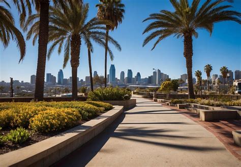 The San Diego Skyline With Iconic Landmarks Like The Uss Midway Balboa