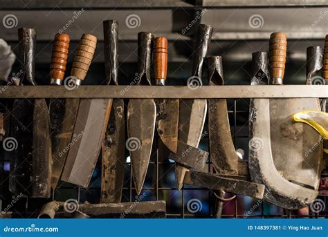 Metal Smith Sharpening Farm Tools And Knives Stock Image Image Of