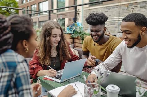Multicultural University Students Using Lapto Premium Ai Generated Image