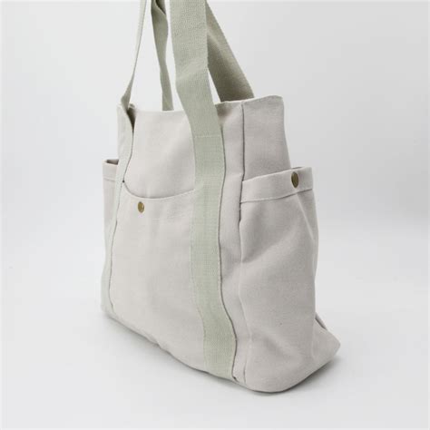 Large Canvas Tote Bag With Pockets And Zipper In Beige Harlow And Lloyd