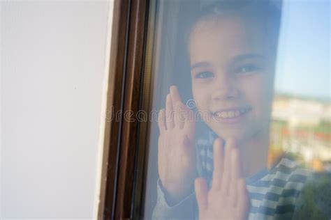 Happy Teen Girl Look Out Of Window Outside Recovered Stock Image