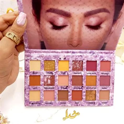 خرید و قیمت پالت سایه چشم 18 رنگ هدا بیوتی آیینه دار Hudabeauty شاین و مات کد 01 جلد بنفش از