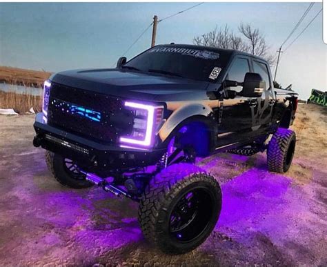 Jacked Up Chevy Truck With Purple Lights Custom Lifted Trucks Lifted