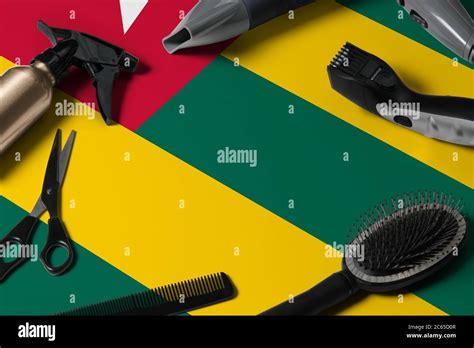 Togo Flag With Hair Cutting Tools Combs Scissors And Hairdressing