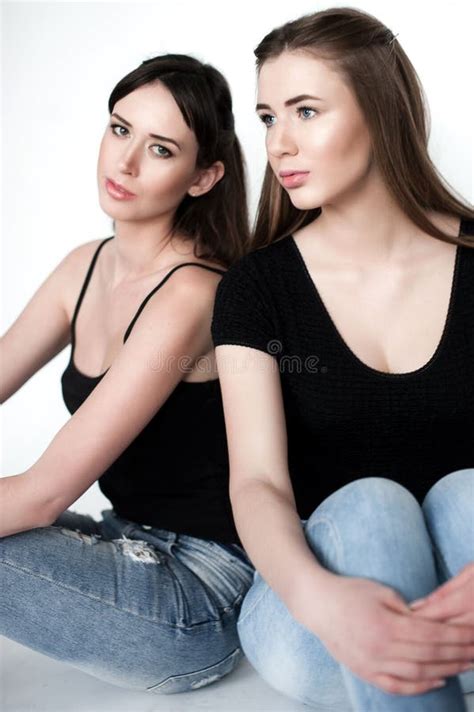 Young And Beautiful Sisters In Friendship Sharing Joy Trust L Stock