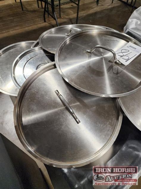 Assorted Pot Lids Iron Horse Auction Company