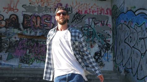 Stylish Man Performing Dance Moves On City Streets The Guy Is Dancing