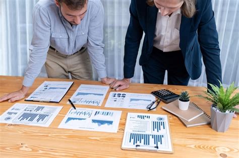 Premium Photo Analyst Team In Office Analyzing Financial Data