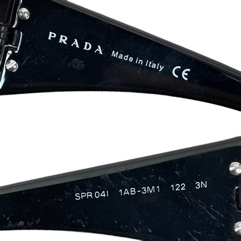 Prada Rimless Wraparound Sunglasses In Black Nitryl