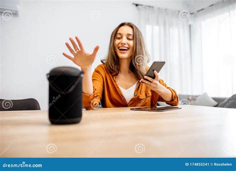 Woman Controlling Home Devices With A Voice Commands Stock Image Image Of Digital Sitting