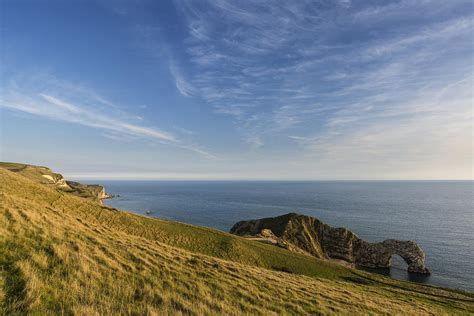 Stunning Natural Cove Coastal Landscape At Sunset With Beautiful