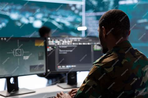 Premium Photo Officer Managing Surveillance Cctv System With Data